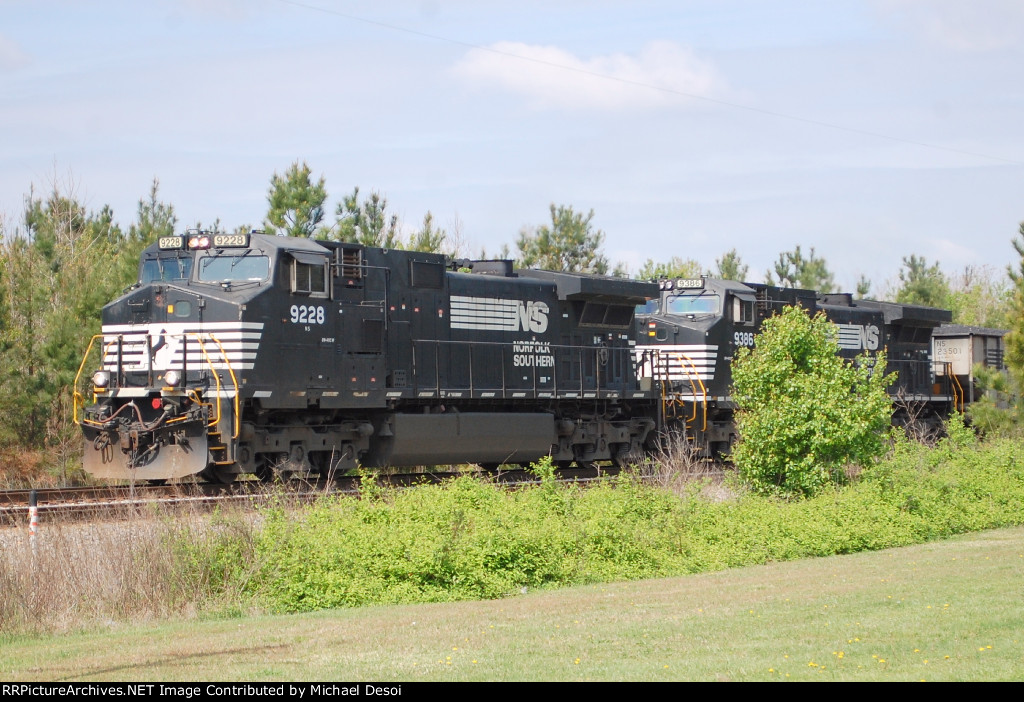 NS C40-9W #9228 leads an eastbound off Route 460